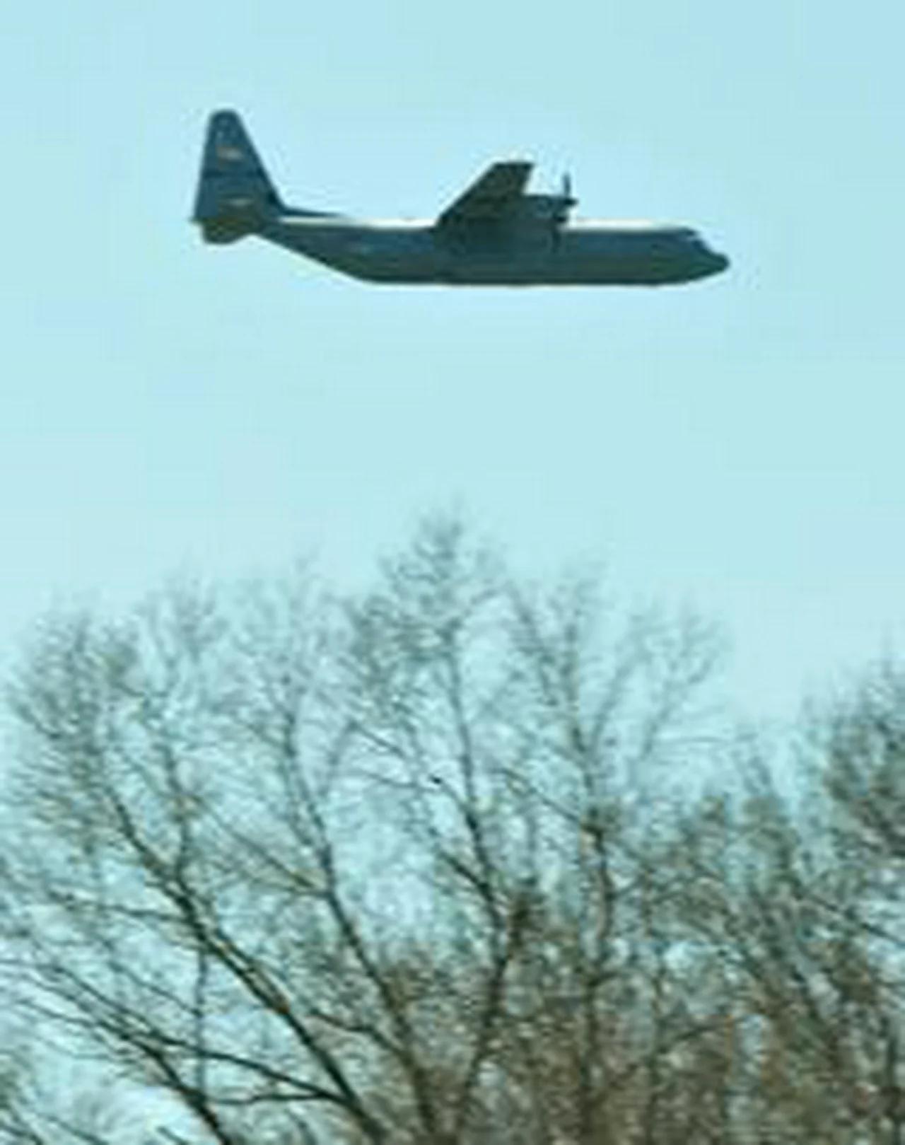Military aircraft flying extremely low and slow. Drills? I think not.