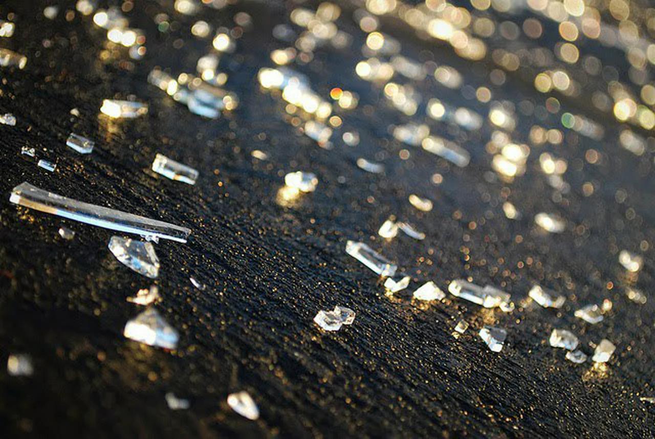 Glint of Light on Broken Glass
