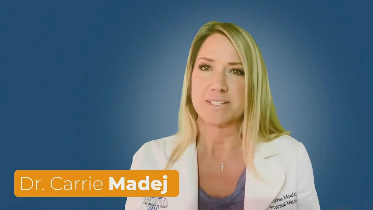 Dr. Carrie Madej, explaining the 3 major components of the Moderna ...