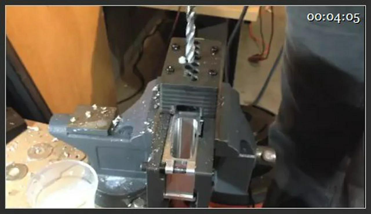 Drill out an 80% AR-15 Lower in 5 min with hand drill - 80% Arms Easy Jig