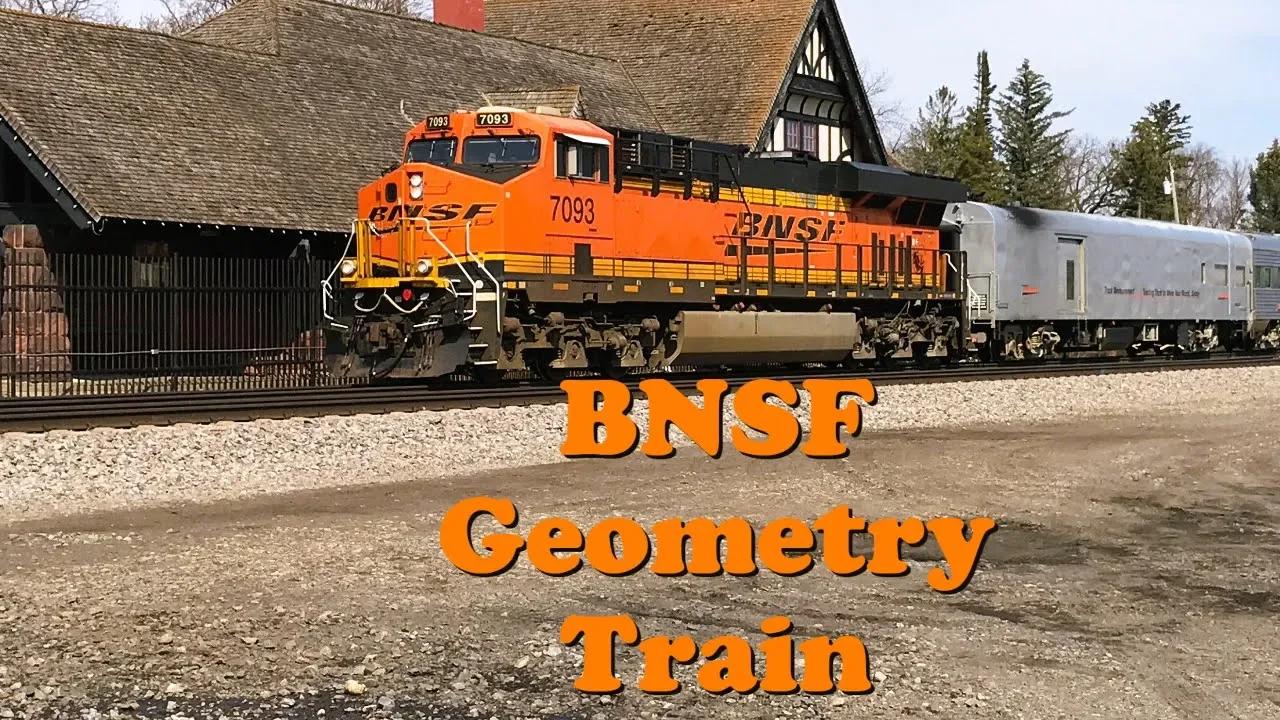 BNSF Geometry Train passing the Northern Pacific Depot