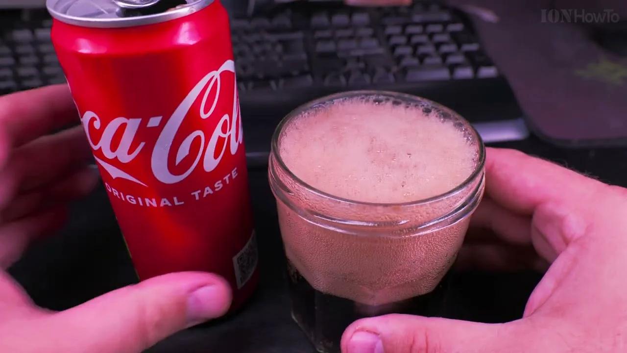 How to open a can of Coca Cola