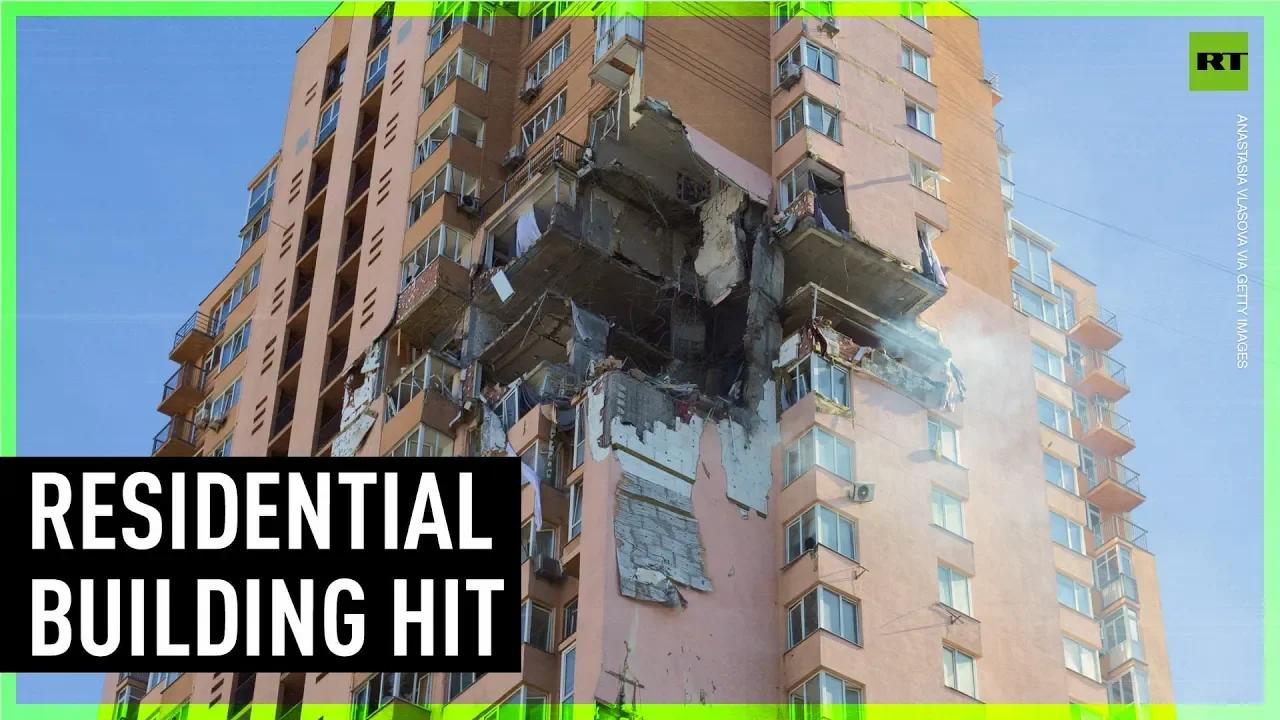 Projectile smashes into residential building in Kiev