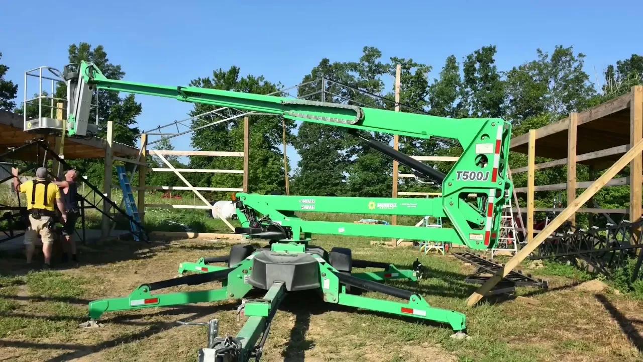 Couple builds off grid 40 x 60 Pole barn Time lapse video of DIY pole barn