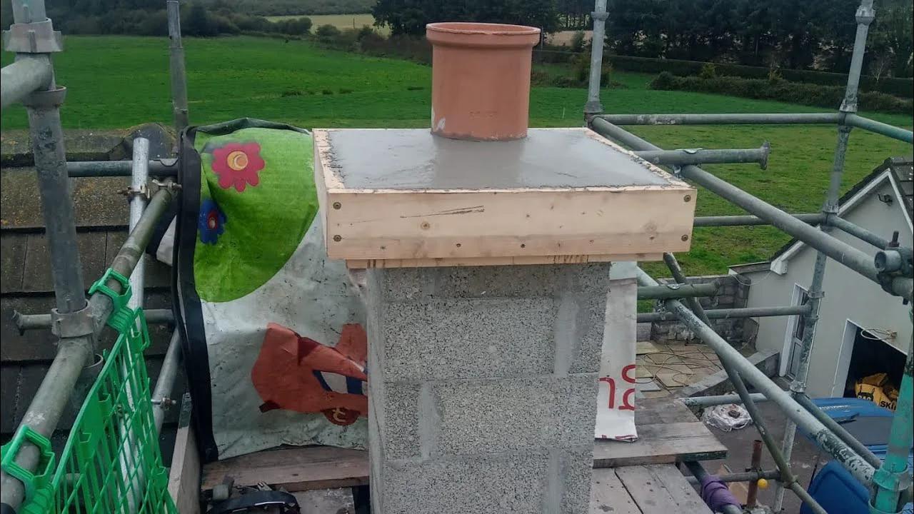Rebuilding a block chimney.