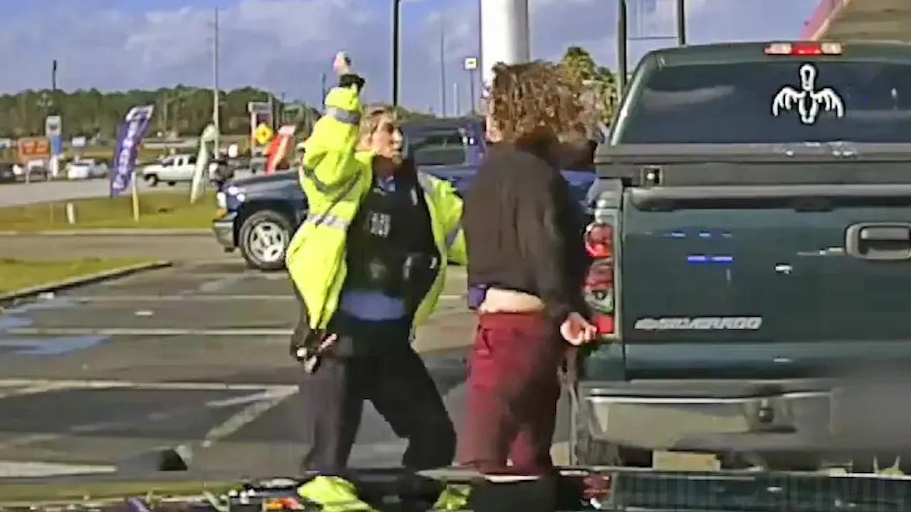 Dashcam Video Captures Georgia Deputy Hitting Driver During Traffic Stop Dashcam Video Captures Georgia Deputy Hitting Driver During Traffic Stop