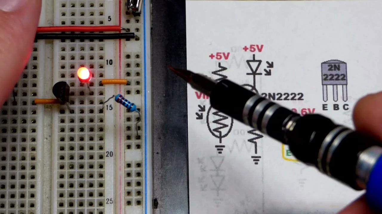 LDR lights an LED brighter as it gets darker using 2N2222 NPN BJT and ...