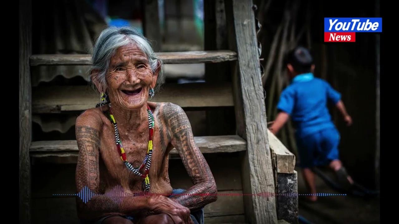 Tradition of hand-tapping tattoos for "as long as her eyes can see"