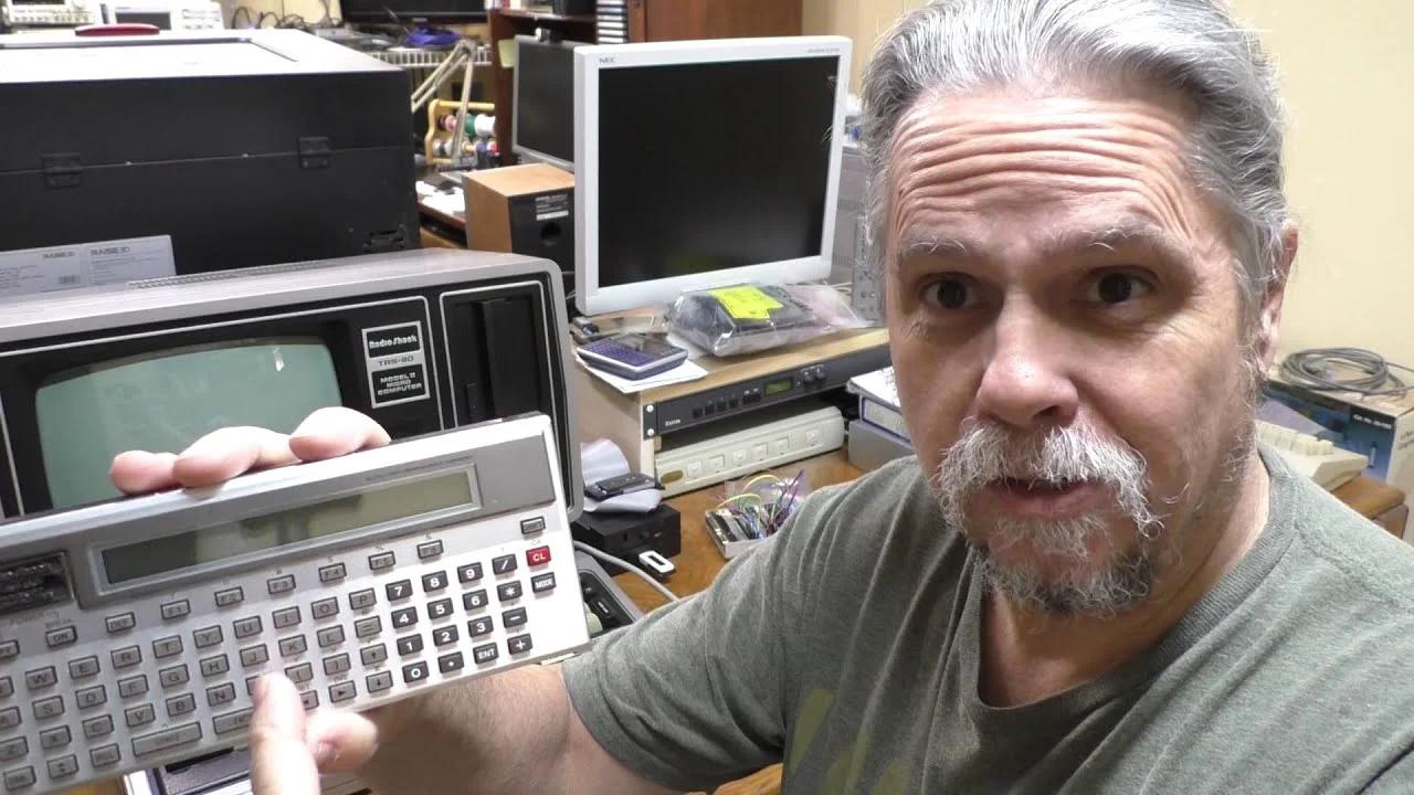 Interfacing the TRS-80 Model II and PC-2. The two ends of the TRS-80 ...