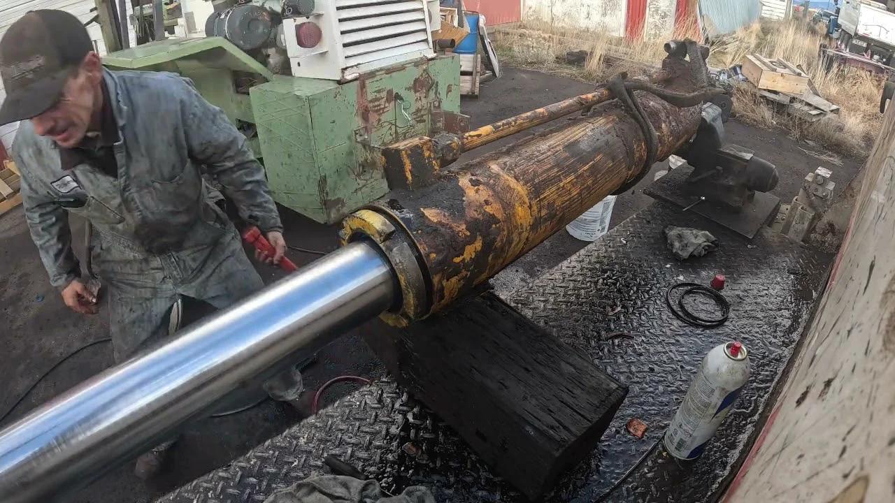 Repacking hydraulic cylinders.