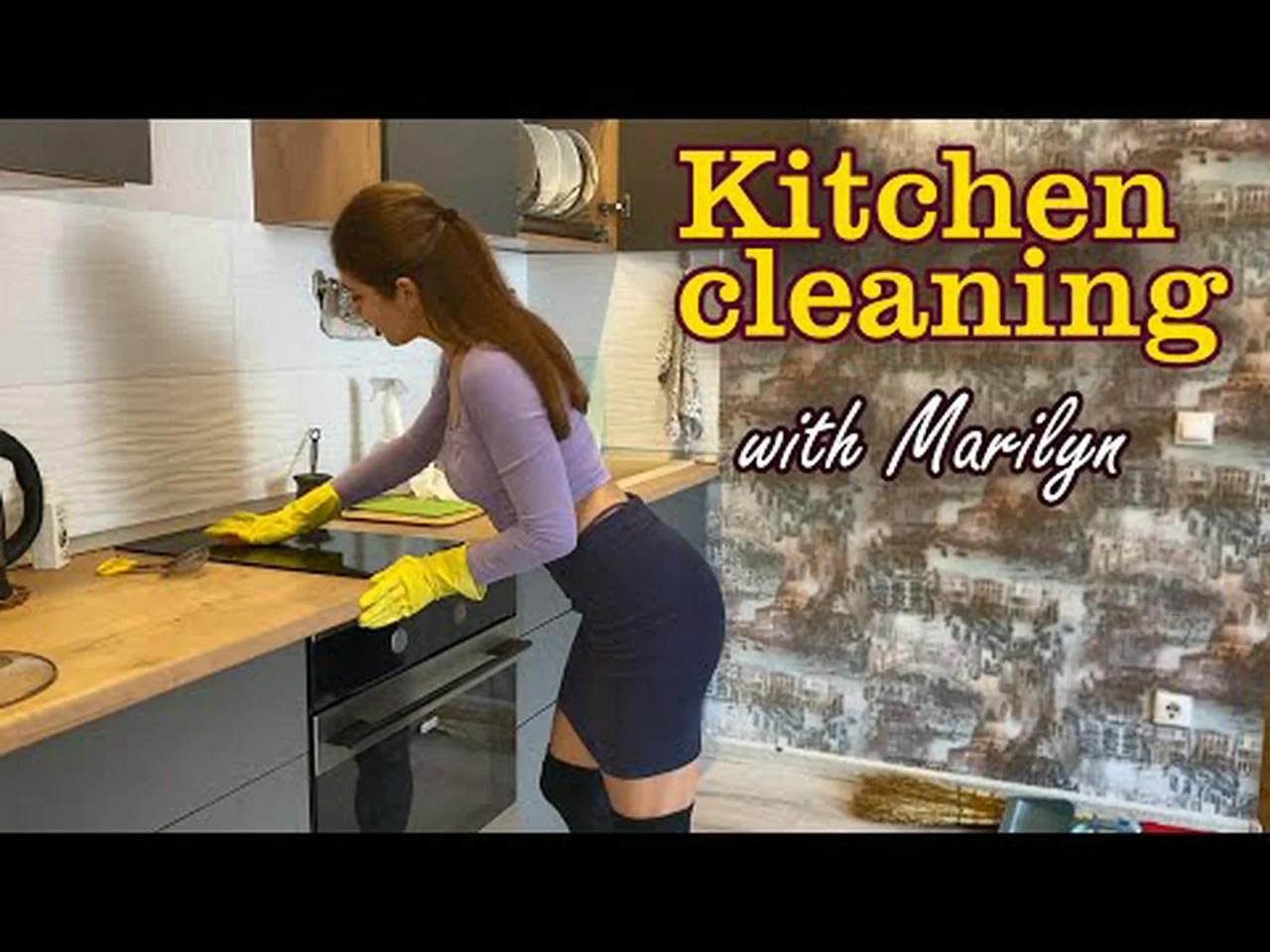 Kitchen cleaning routine in rubber gloves and stockings