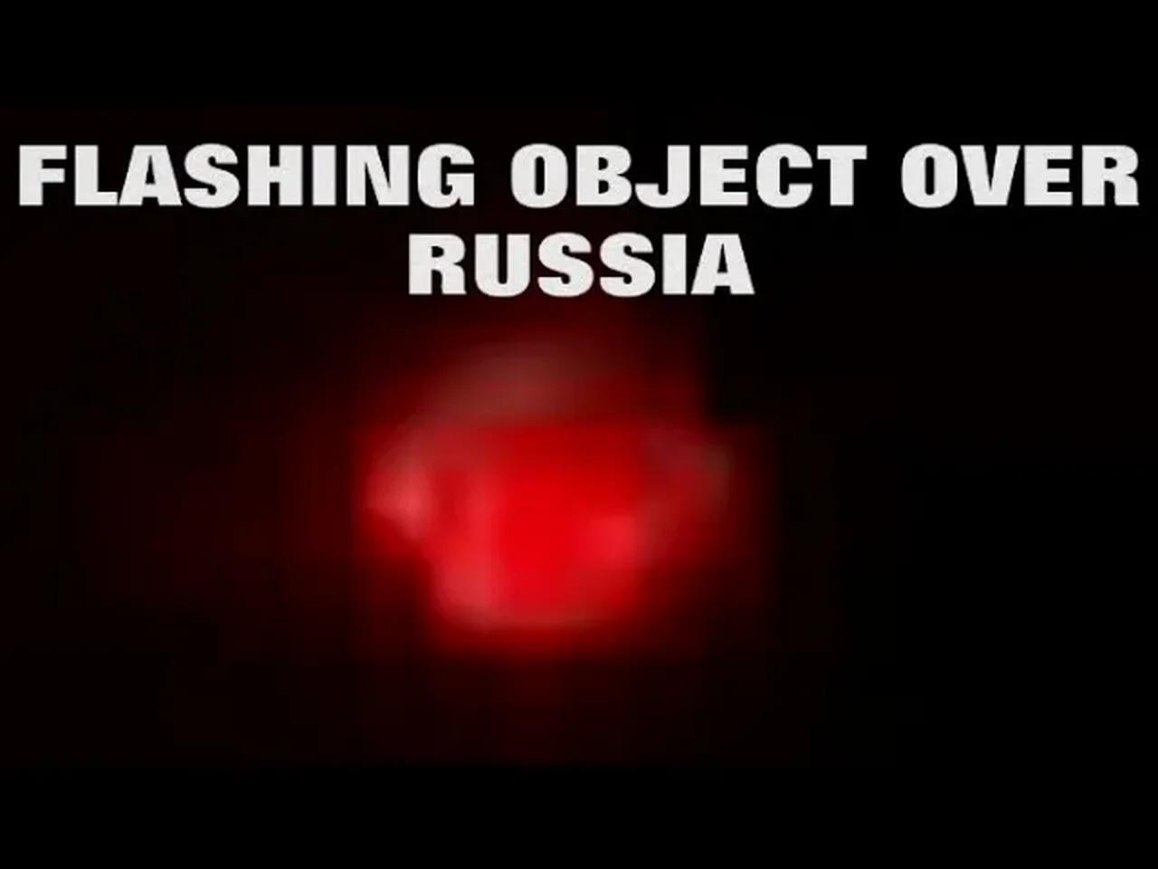 Bright Flashing Object dropping orbs over Russia on 11/21/2021