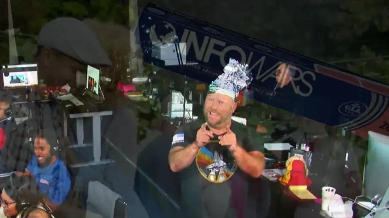 ALEX JONES MODELS NEW TINFOIL HAT