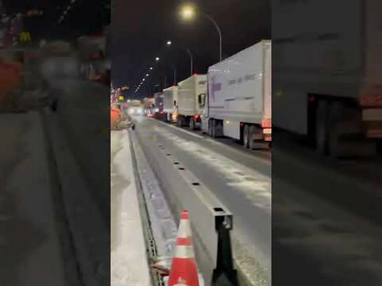 Trucker protest shuts down Ambassador Bridge between Detroit and ...