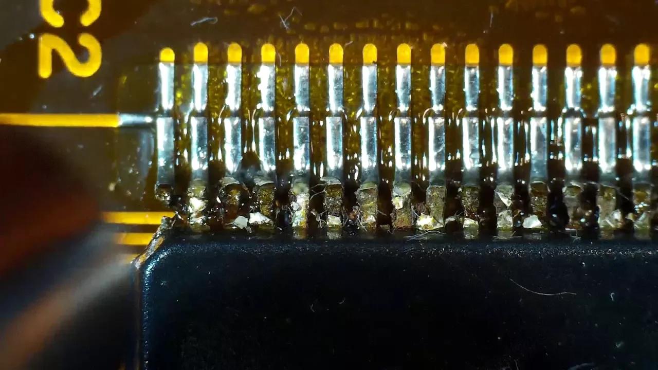 Removing corroded chip. Pins are pretty much gone.
