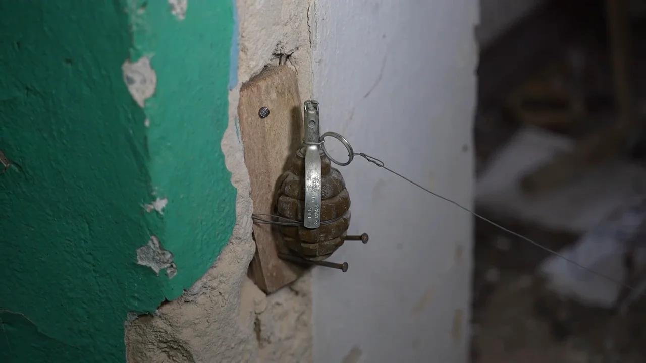 Removing explosive traps left by retreating Ukraine army