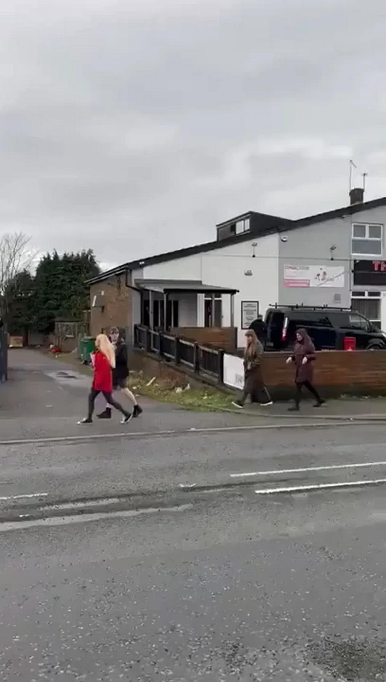 London, England — Angela Rayner having a hard time walking down the street