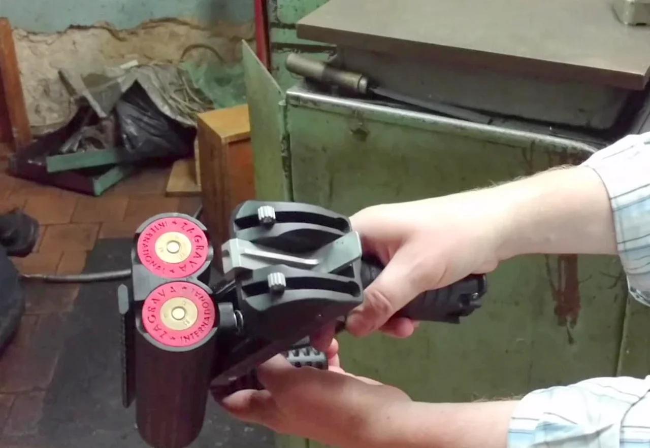 3D printed 37mm double barrel non-lethal launcher. 3D printed 37mm double barrel non-lethal launcher.