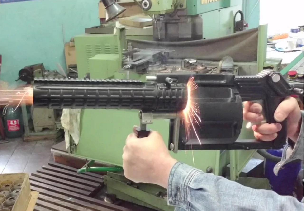 3D printed non-lethal grenade launcher 37mm revolver-type.