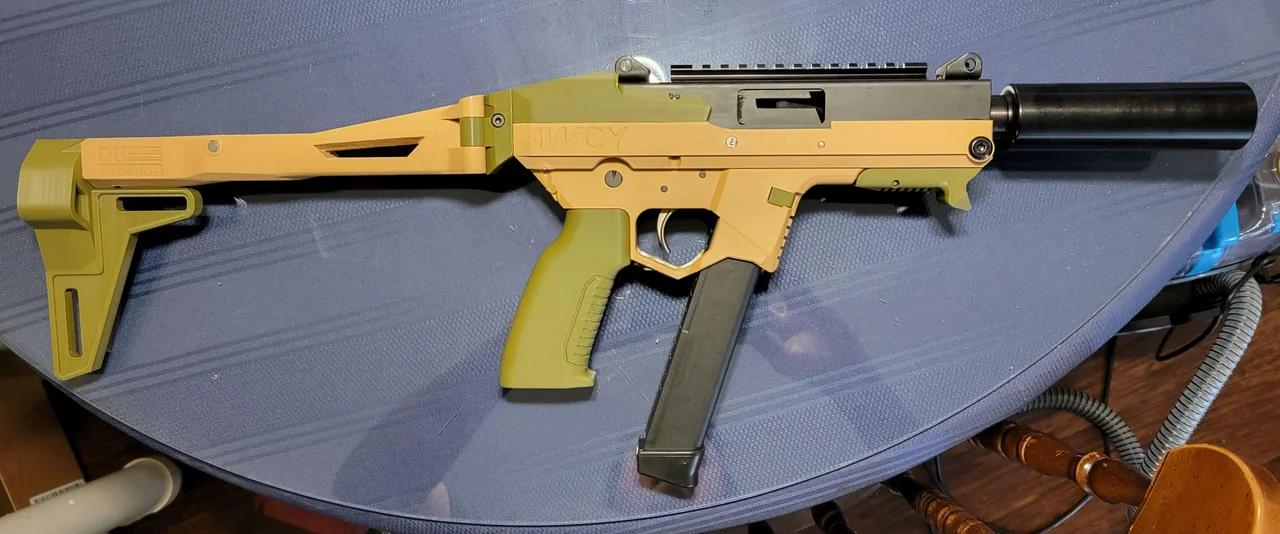 DB9 slim revised brace button and mount