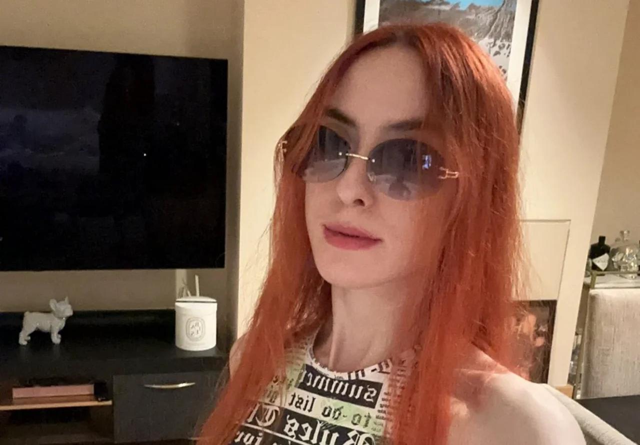 Trollcow in shades, newspaper top with large TV