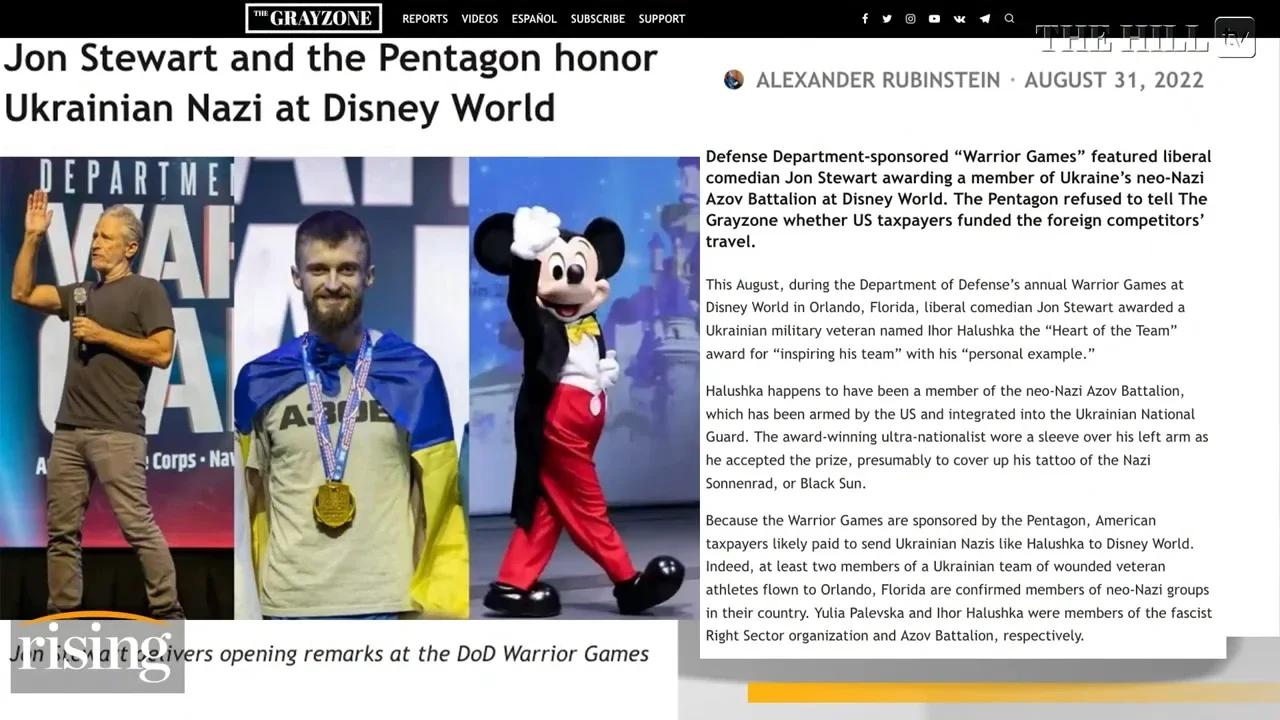 Jon Stewart- DOD Honor AZOV BATTALION NAZI At Disney World
