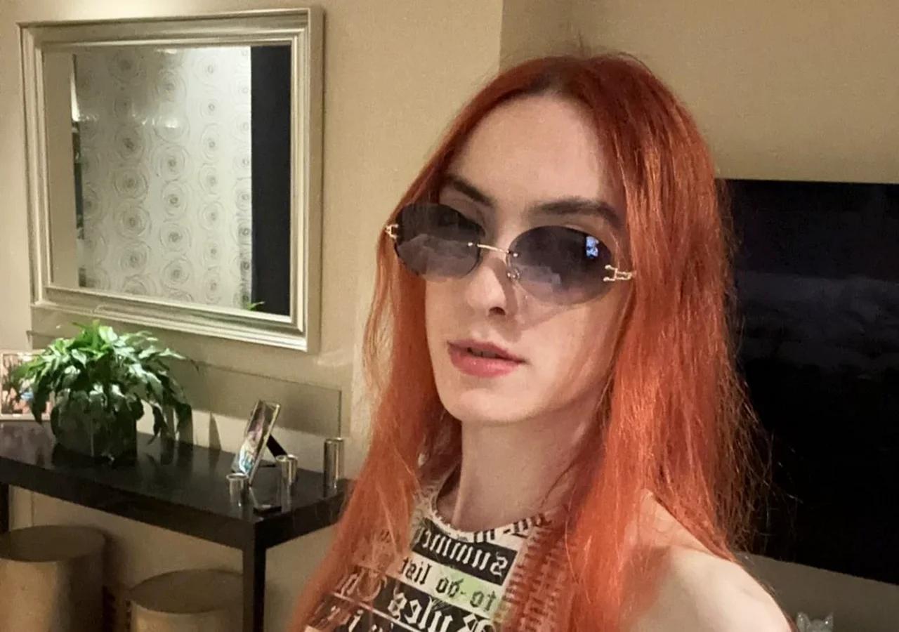 Trollcow in shades, newspaper top with large mirror