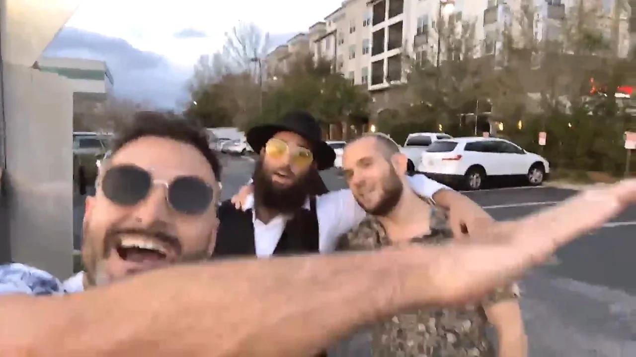 Handsome Truth confronts Jews in front of Chabad in Florida
