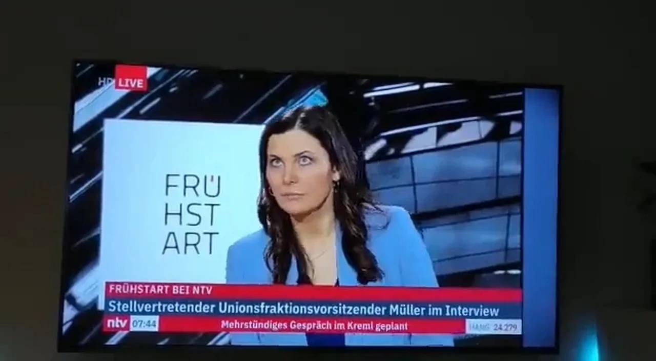 German News Reporter Shows Off Her Vax-Brain