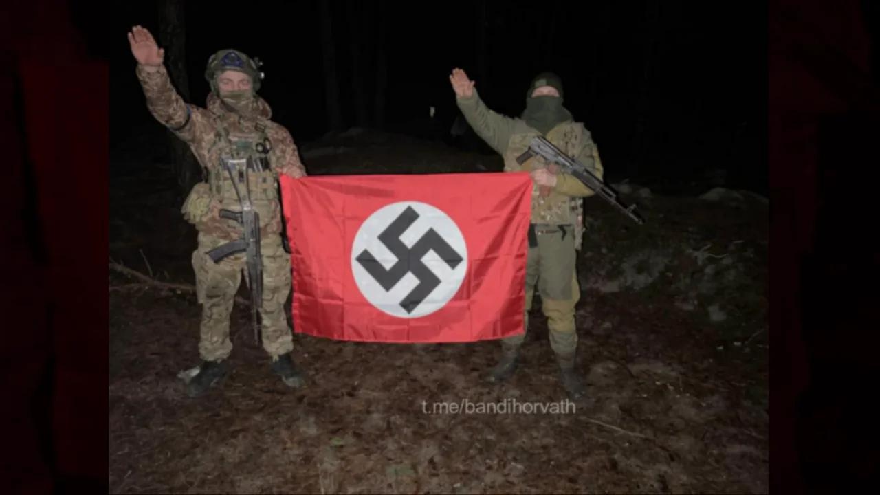 Ukrainian Nazis with Swastika flags.