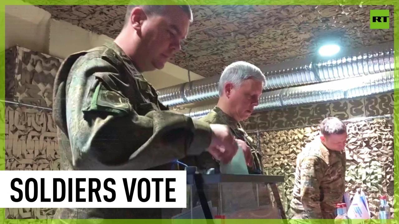 Soldiers in Donetsk take part in early voting for Russian presidential ...