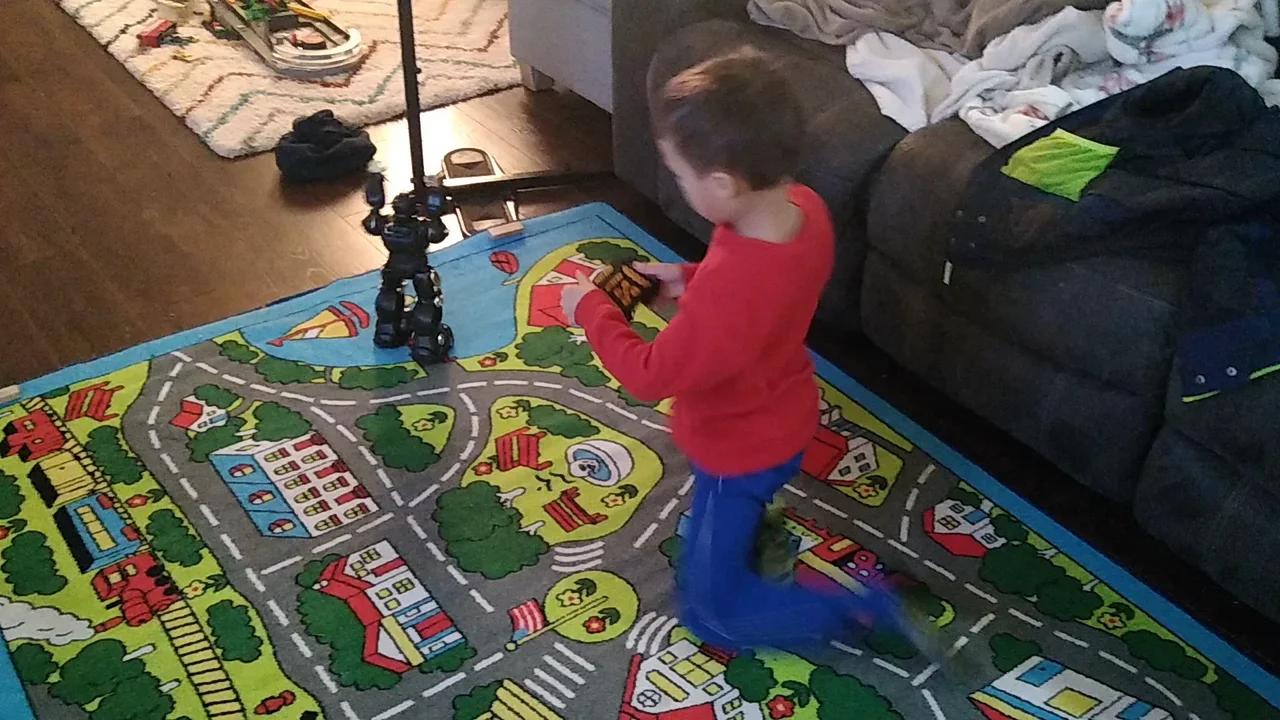 Jason Playing WIth HIs Ninja Robot