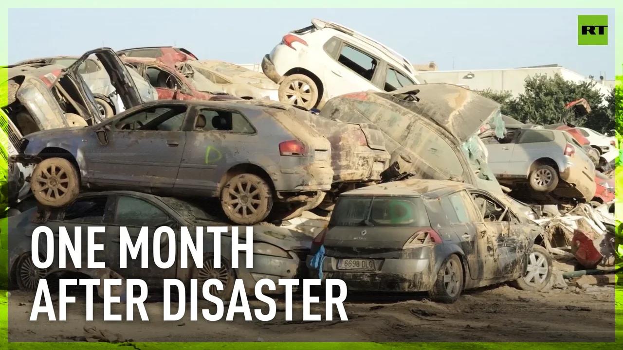 Hundreds of damaged cars piled up in Valencia one month after deadly ...
